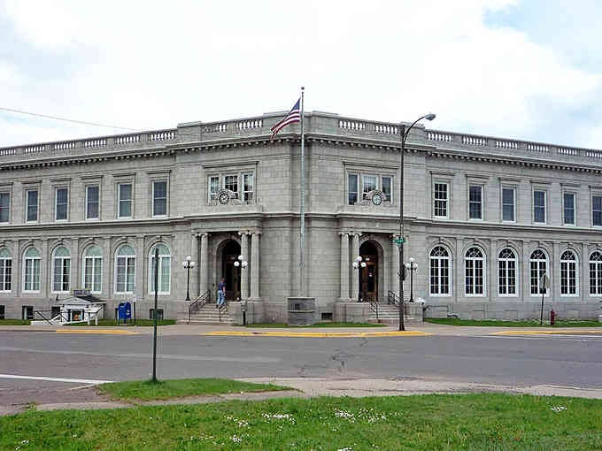 This neoclassical beauty commands respect with columns and stonework that declare permanence in an ever-changing world.