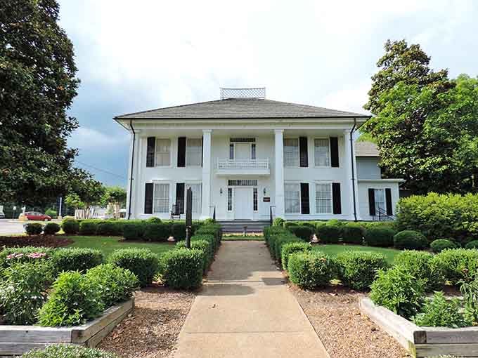 Classic white columns grace this antebellum home, proving that elegance and affordability can share the same charming Southern address.