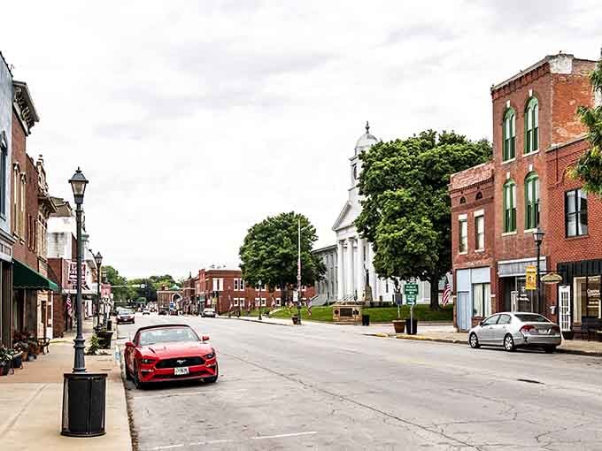 This courthouse gleams like a wedding cake made of brick, standing tall against blue skies for generations now.