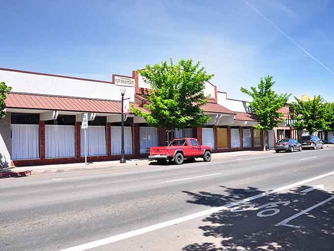 Vintage storefronts with those classic red awnings create postcard-perfect streets where window shopping is its own afternoon entertainment.
