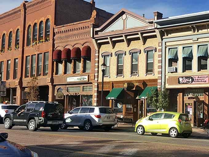 Victorian-era brick architecture glows warmly in afternoon light, inviting you to explore every charming storefront within.