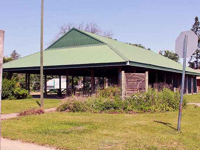 A bright green roof and wildflower gardens make McGrath's pavilion look like the friendliest picnic spot in all of Aitkin County.
