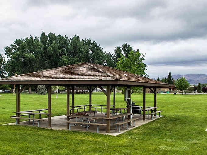 A peaceful pavilion sits ready for family gatherings where the only agenda is enjoying each other's company.