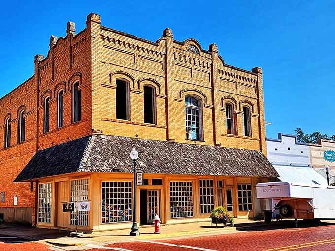 Ornate brickwork and arched windows frame a downtown where your money buys more than just square footage.