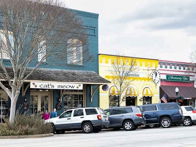 Bright yellow awnings pop against historic buildings, proving small-town charm doesn't mean boring color palettes.