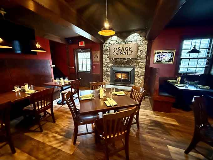 That stone fireplace and warm lighting create the cozy ambiance your grandmother would approve of wholeheartedly.