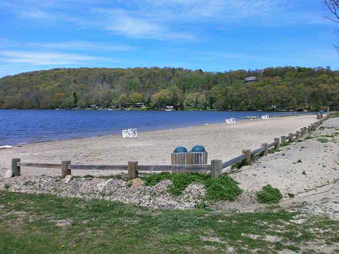 The sandy beach stretches invitingly along the shore, practically begging you to kick off your shoes and stay awhile.