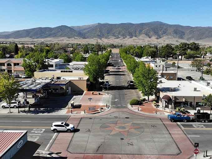 Tree-lined main street offers small-town charm where community gatherings still matter more than Instagram followers.