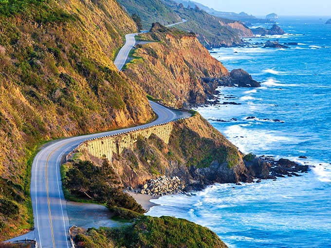 The highway clings to cliffs above crashing surf, offering views that make California's Big Sur jealous of Oregon.