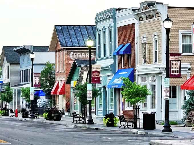 Painted facades create a rainbow of commerce that makes shopping feel like an actual adventure worth taking.