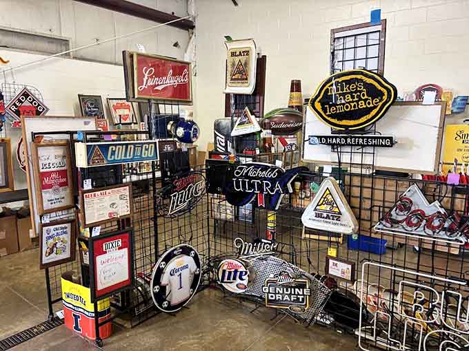 Classic beer and soda signs that once hung in corner stores now waiting for your man cave.