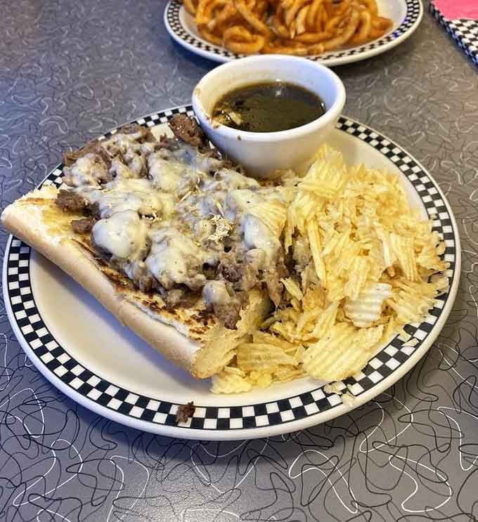 French dip sandwich oozing with melted cheese and au jus for dunking makes lunchtime feel like winning the lottery.