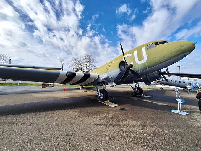 This C-53 Skytrooper carried paratroopers into history, its weathered paint telling stories words never could capture fully.