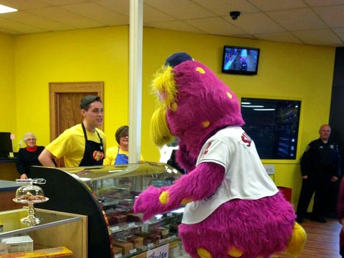 Even mascots need their candy fix, and this purple friend knows exactly where to find the good stuff.