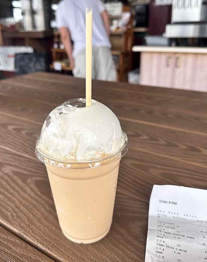 That milkshake topped with whipped cream is basically a hug in a cup, sweet and completely satisfying.