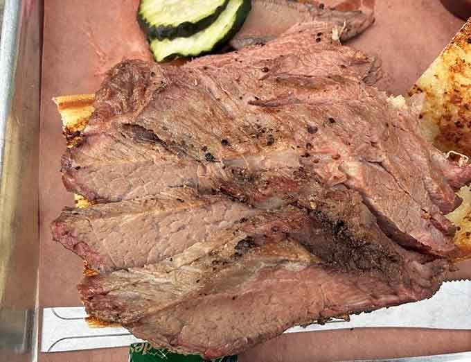 Sliced tri-tip that looks tender enough to cut with a stern glance, California barbecue at its finest.