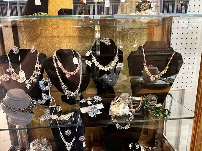 Rhinestones and pearls catch the light like a jewelry box exploded in the most elegant way imaginable here.