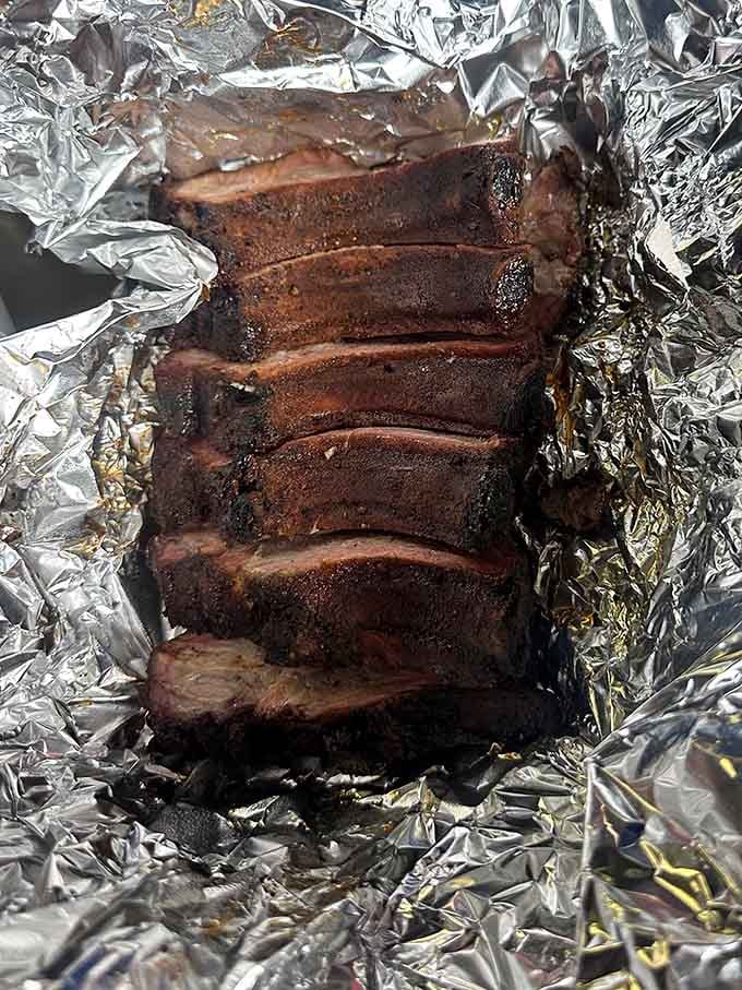 Ribs so tender the meat practically waves goodbye to the bone before you even take a bite.