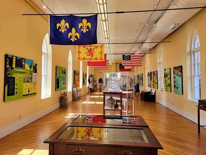 Historic flags hanging from the ceiling tell stories that textbooks never quite capture with the same vivid authenticity.