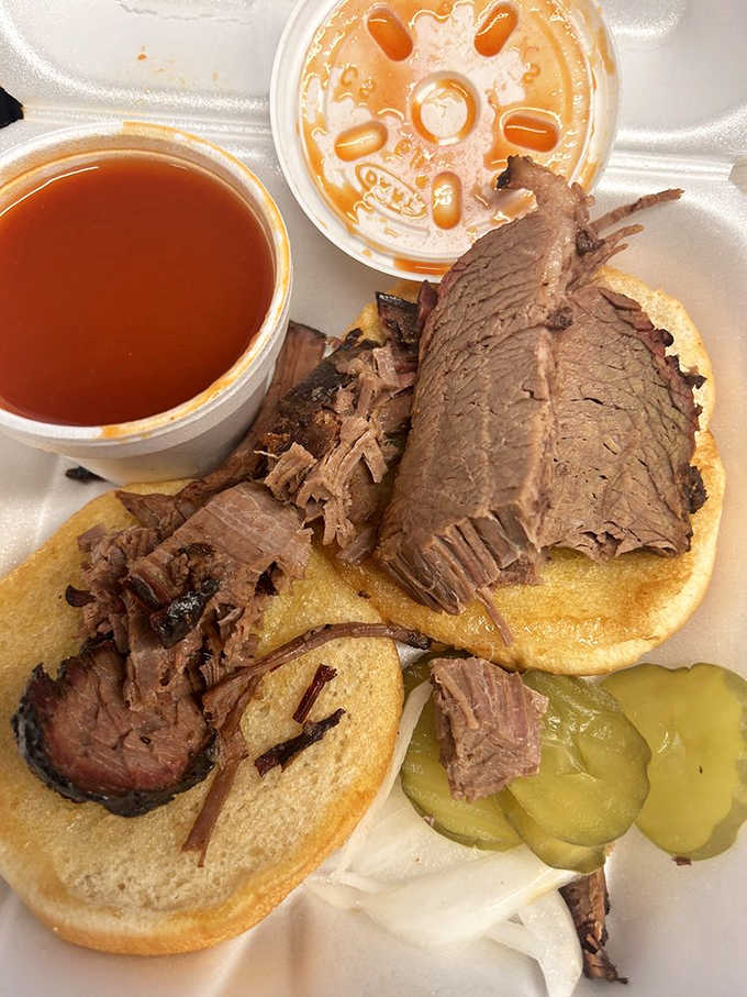 Sliced brisket piled high with pickles and sauce makes every other sandwich seem like child's play.