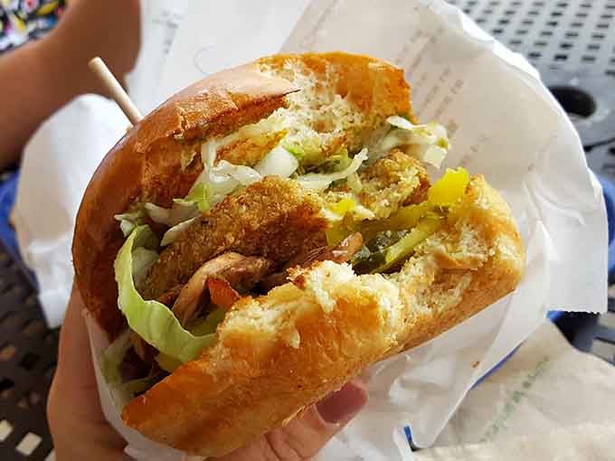 The quinoa burger sits there looking surprisingly substantial, proving vegetarian options can hold their own here.