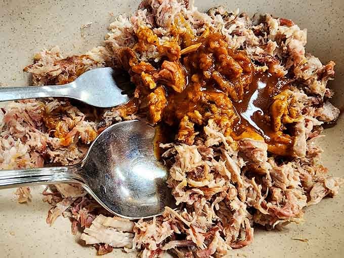 Pulled pork this tender doesn't need a knife, just a fork and maybe some extra napkins for dignity.