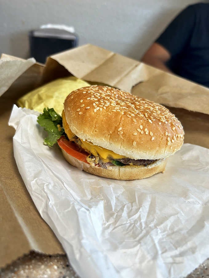 A perfectly grilled burger on a toasted bun proves that some recipes don't need improving, just repeating.