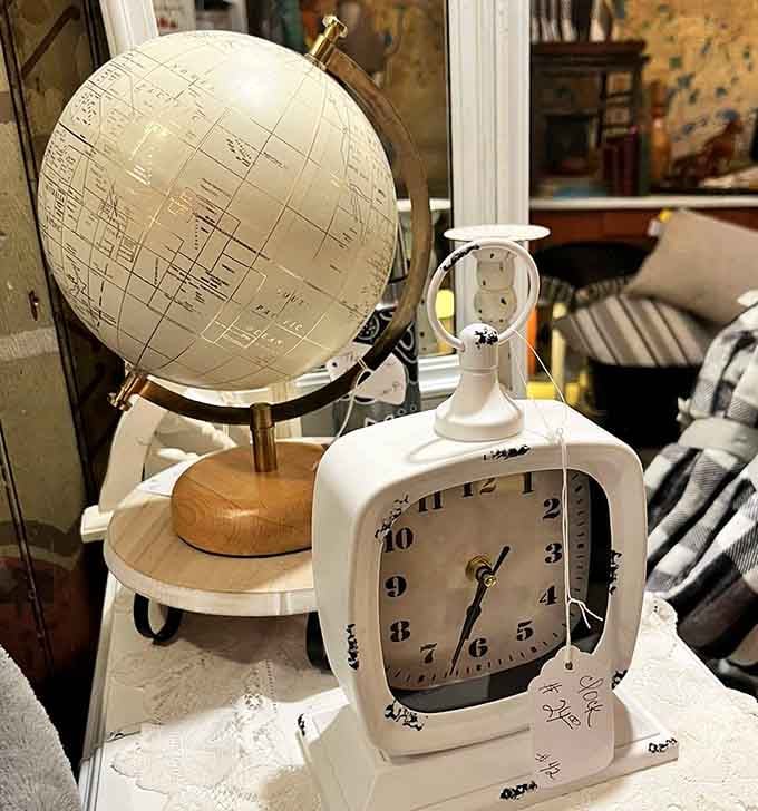 A vintage globe and retro clock prove that time and geography never go out of style, just waiting patiently.