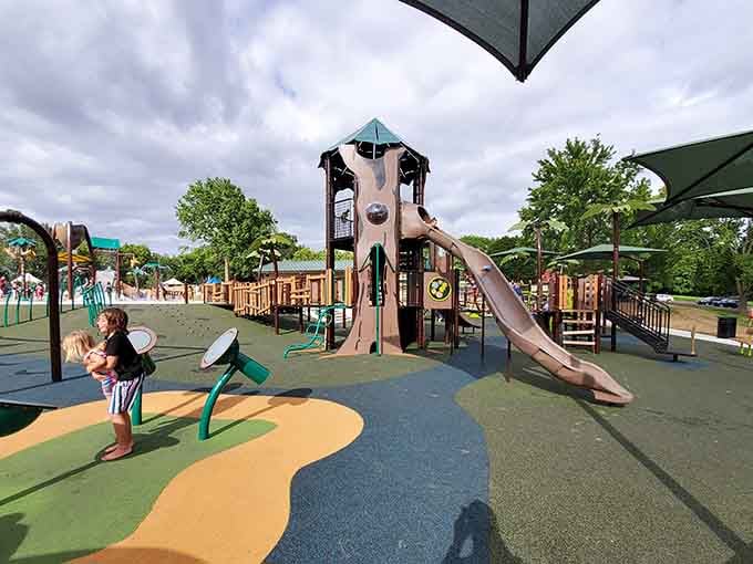 A playground that proves someone actually remembered what being a kid feels like, palm trees included.