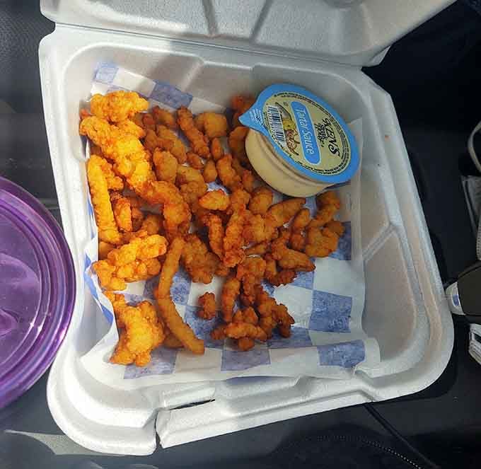 Clam strips and crinkle fries proving that simple done right beats fancy done wrong every time.