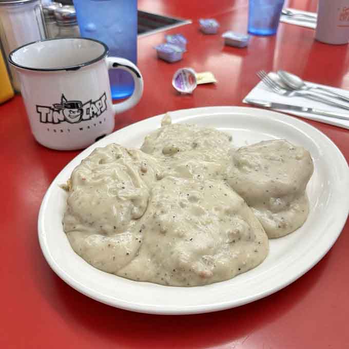Biscuits drowning in sausage gravy, the kind of breakfast that makes you understand why mornings were invented.