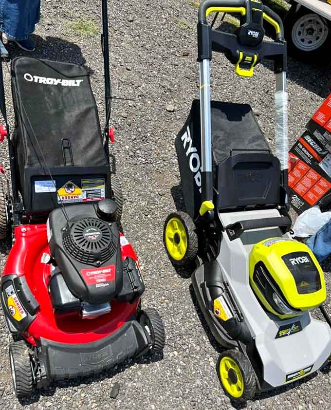 Lawn mowers lined up like eager soldiers ready to battle your overgrown yard into suburban submission this weekend.