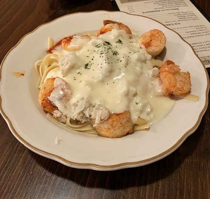 Creamy seafood Alfredo that makes you wonder why anyone ever invented portion control in the first place.