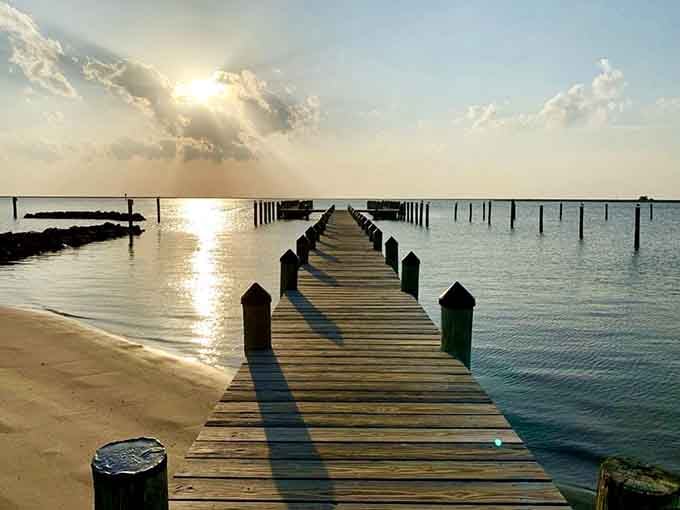 This pier stretching into golden hour perfection makes you understand why people never leave the Eastern Shore.