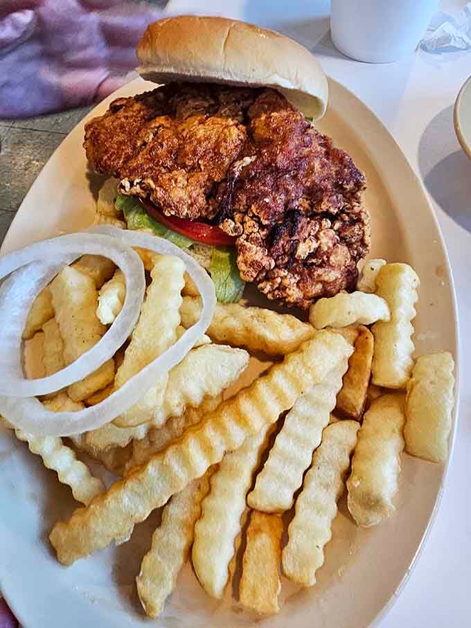 When your tenderloin hangs over the bun like it's trying to escape, you know you're in the right place.