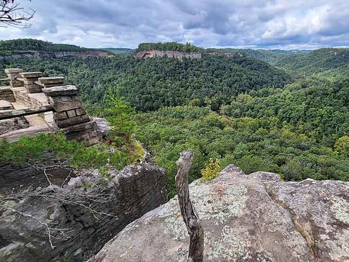 Standing on these ancient rocks, you're looking at layer upon layer of forested ridges stretching toward infinity itself.
