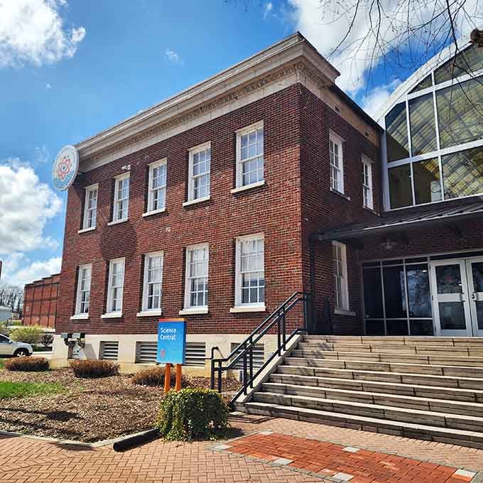 The Danville Science Center's red brick exterior blends historic charm with modern glass, making learning look surprisingly inviting.