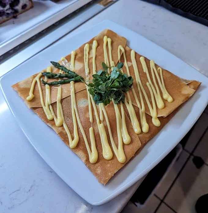 Asparagus and hollandaise sauce dress this buckwheat beauty like it's heading to a garden party.