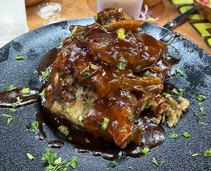 BBQ ribs glazed to perfection, sticky enough to require extra napkins and absolutely zero regrets whatsoever.