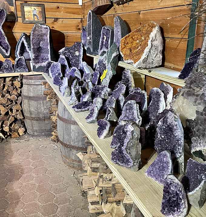 Amethyst geodes lined up like nature's own art gallery, purple perfection in crystalline form.