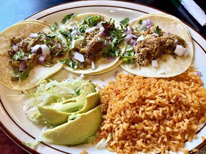Three perfect tacos lined up like edible soldiers ready to march straight into your heart and stomach.