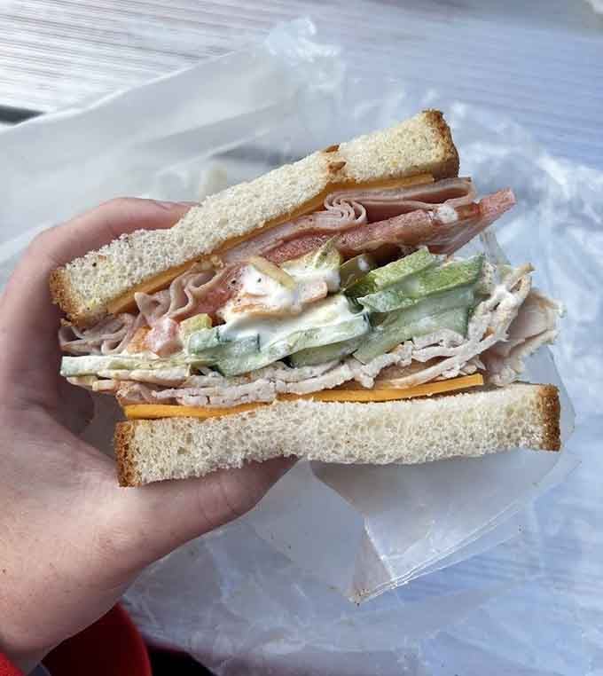 This towering creation proves that sometimes more really is more, especially when you're genuinely hungry for lunch.