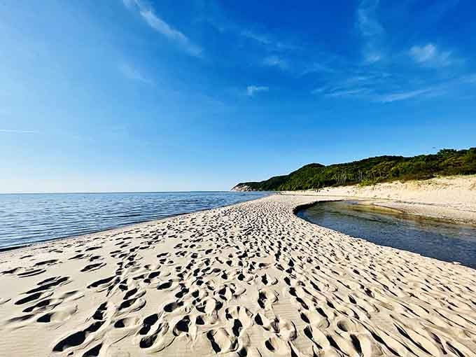 When the lake recedes, it leaves behind rippled sand patterns that look like nature's own abstract artwork.