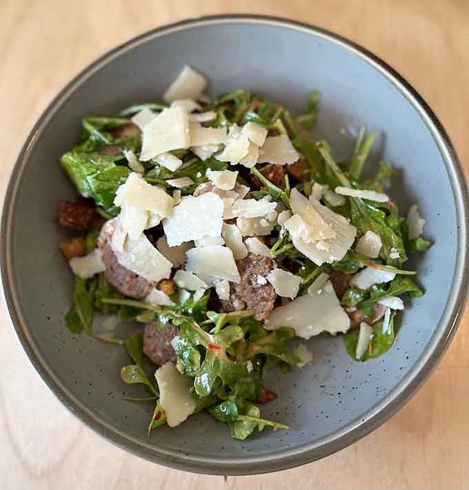 Panzanella salad proves that fresh greens and quality cheese can make you forget you're technically eating something healthy here.