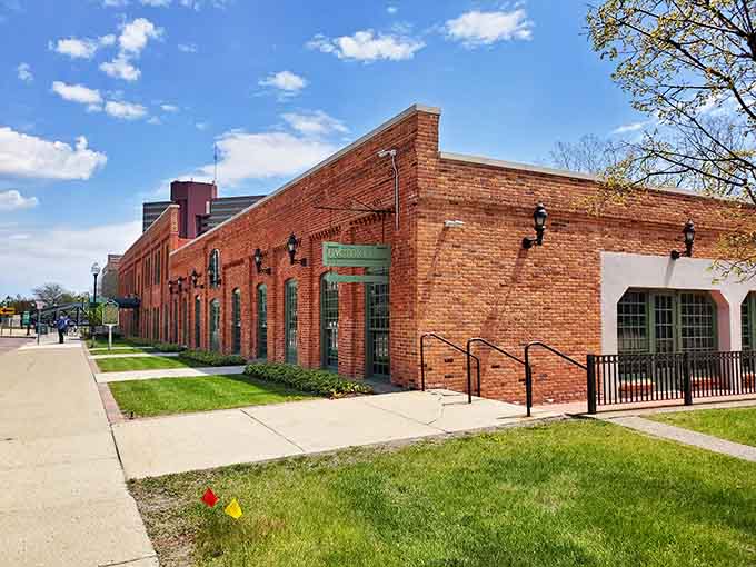 Restored brick industrial buildings now house community treasures, proving old factories can find beautiful new purposes.