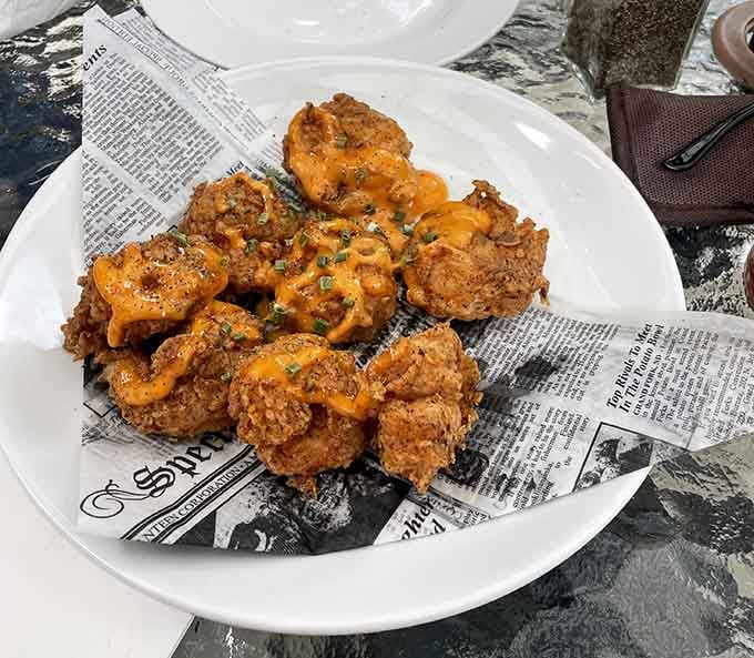 Crispy, saucy, and served on yesterday's news&mdash;because great food doesn't need fancy presentation to taste incredible.
