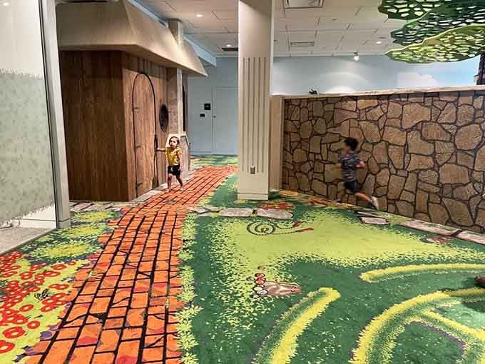 Follow the yellow brick road vibes meet modern children's museum in this delightfully imaginative indoor play space.