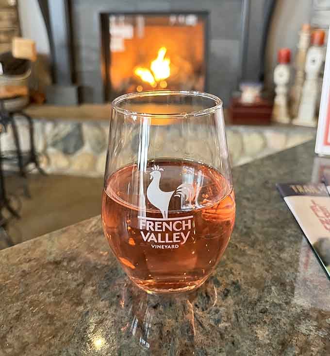 That rosy glow in your glass with a crackling fireplace behind it is basically the definition of cozy contentment.