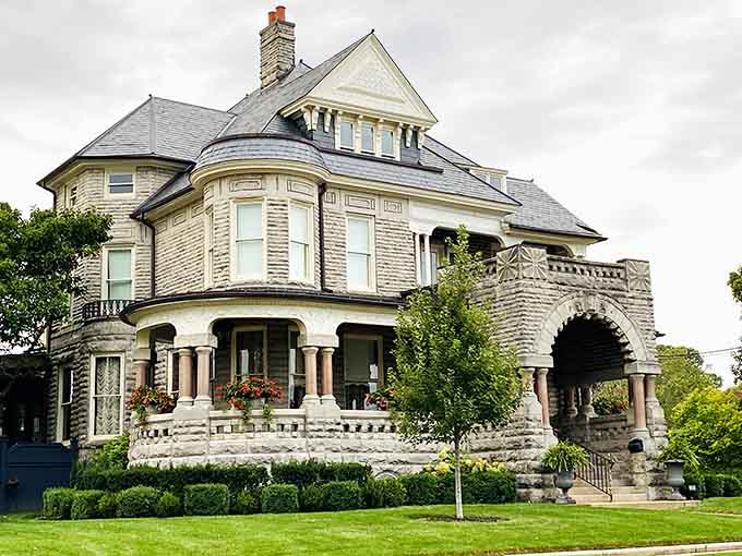That turret and wraparound porch scream Victorian elegance louder than your grandmother's china cabinet ever could, honestly.