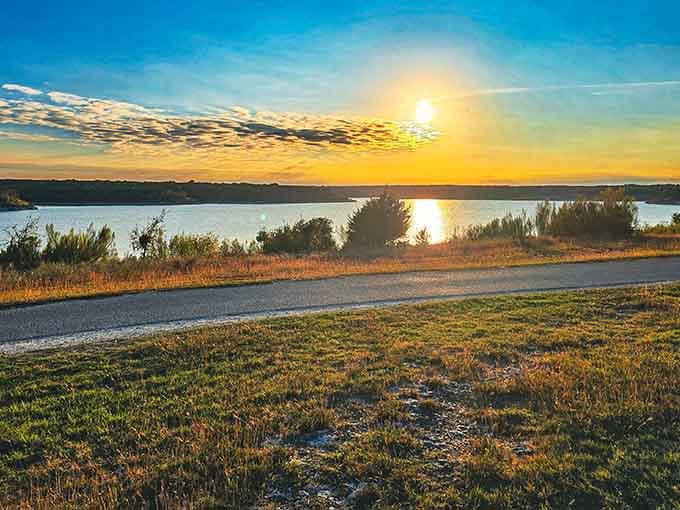 Golden hour transforms this lakeside vista into something Bob Ross would've painted during his happy tree phase.